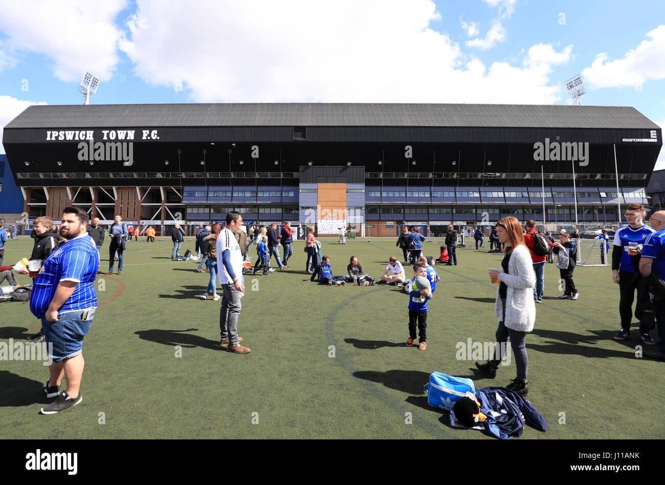 Fans relax on the Portman Road pitch prior to kick off during the Sky ...