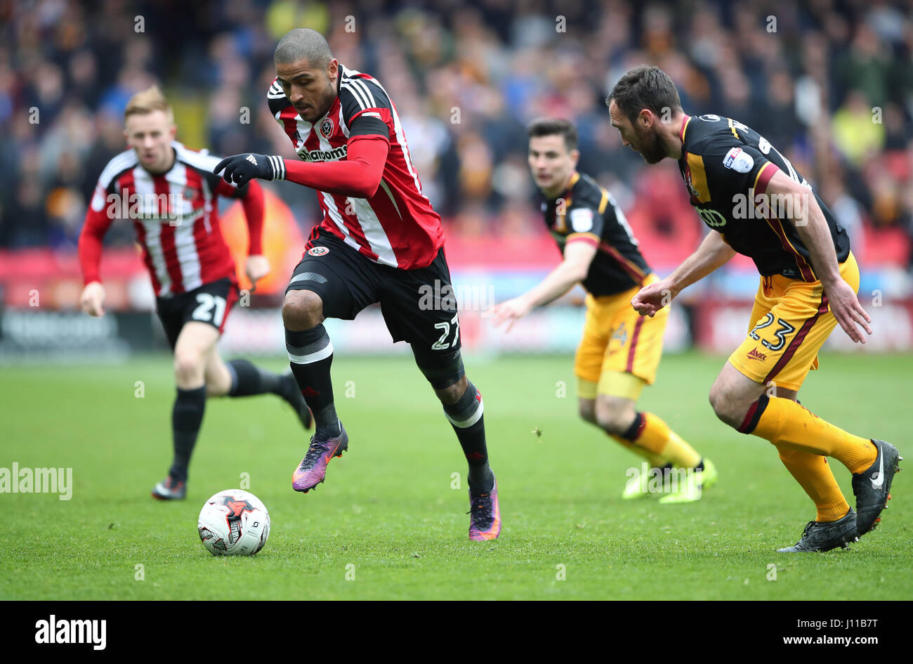 Sheffield United's Leon Clarke (left) and Bradford City's Rory McArdle ...