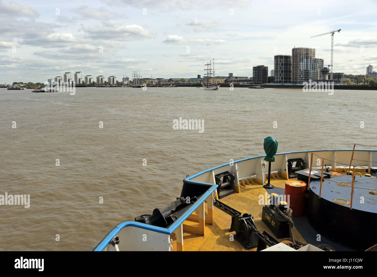 The Woolwich Ferry crossing on the River Thames in London England UK ...