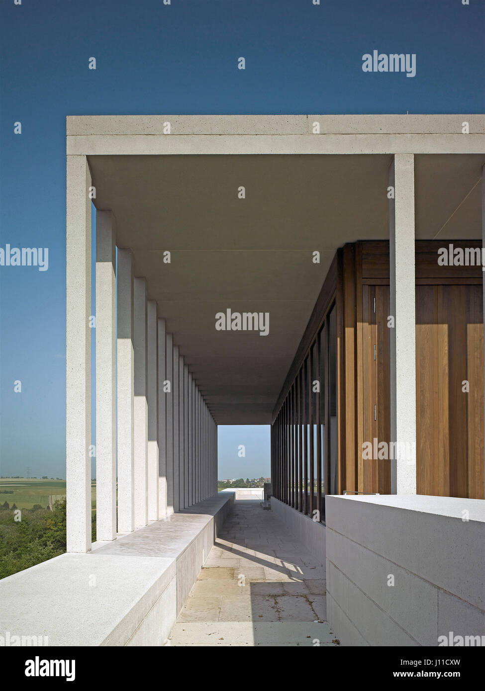 Sunlit elevation along exterior colonnade. Literaturmuseum der Moderne ...