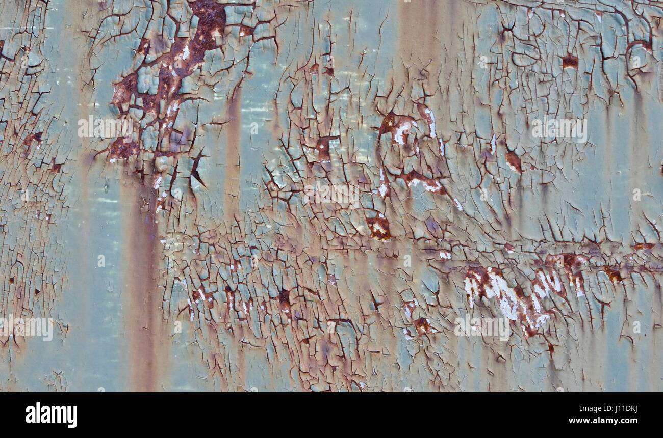 Beautiful isolated photo of the peeled old metal wall Stock Photo - Alamy