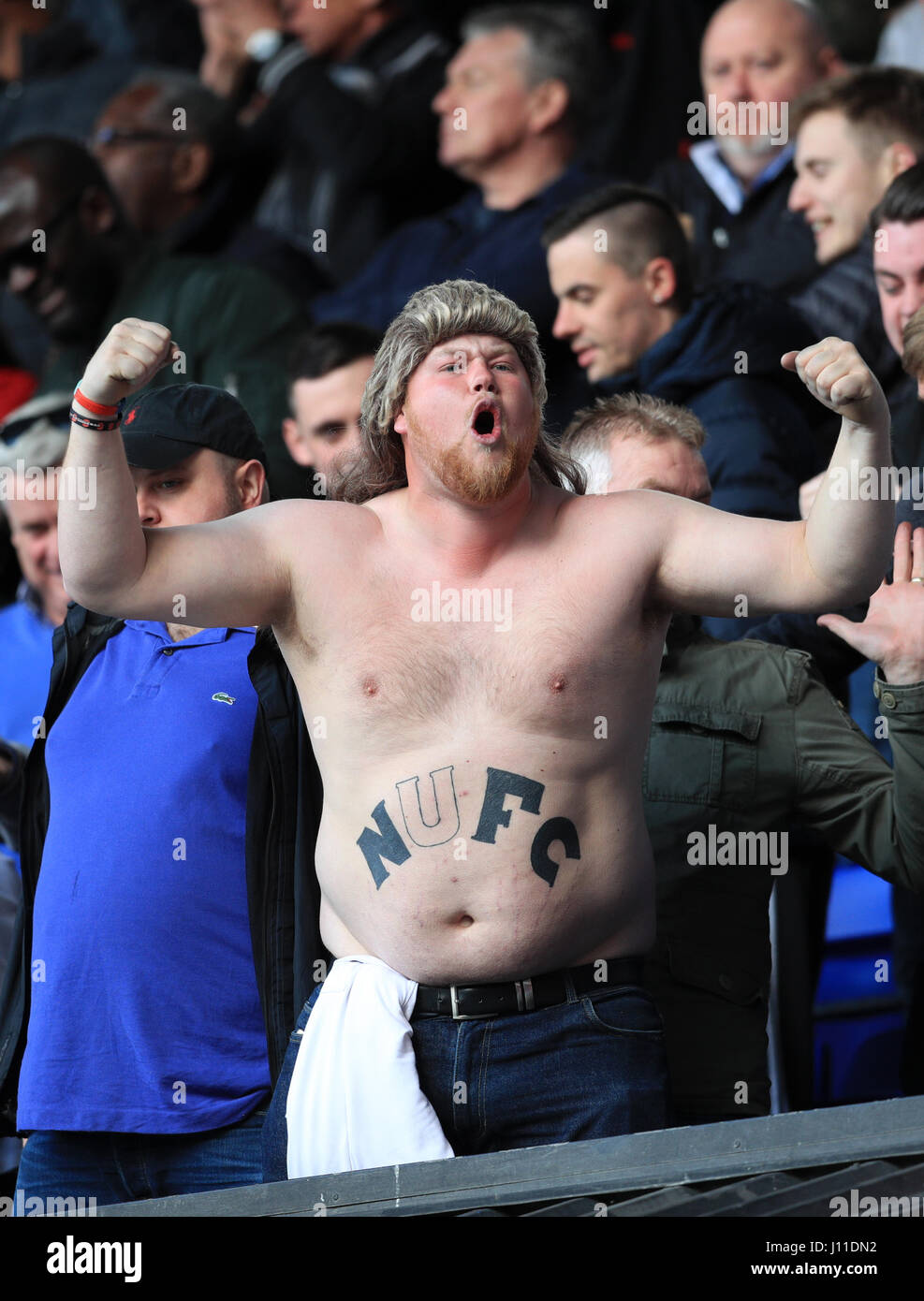 A Newcastle United fan in the stand shows his support during the Sky ...