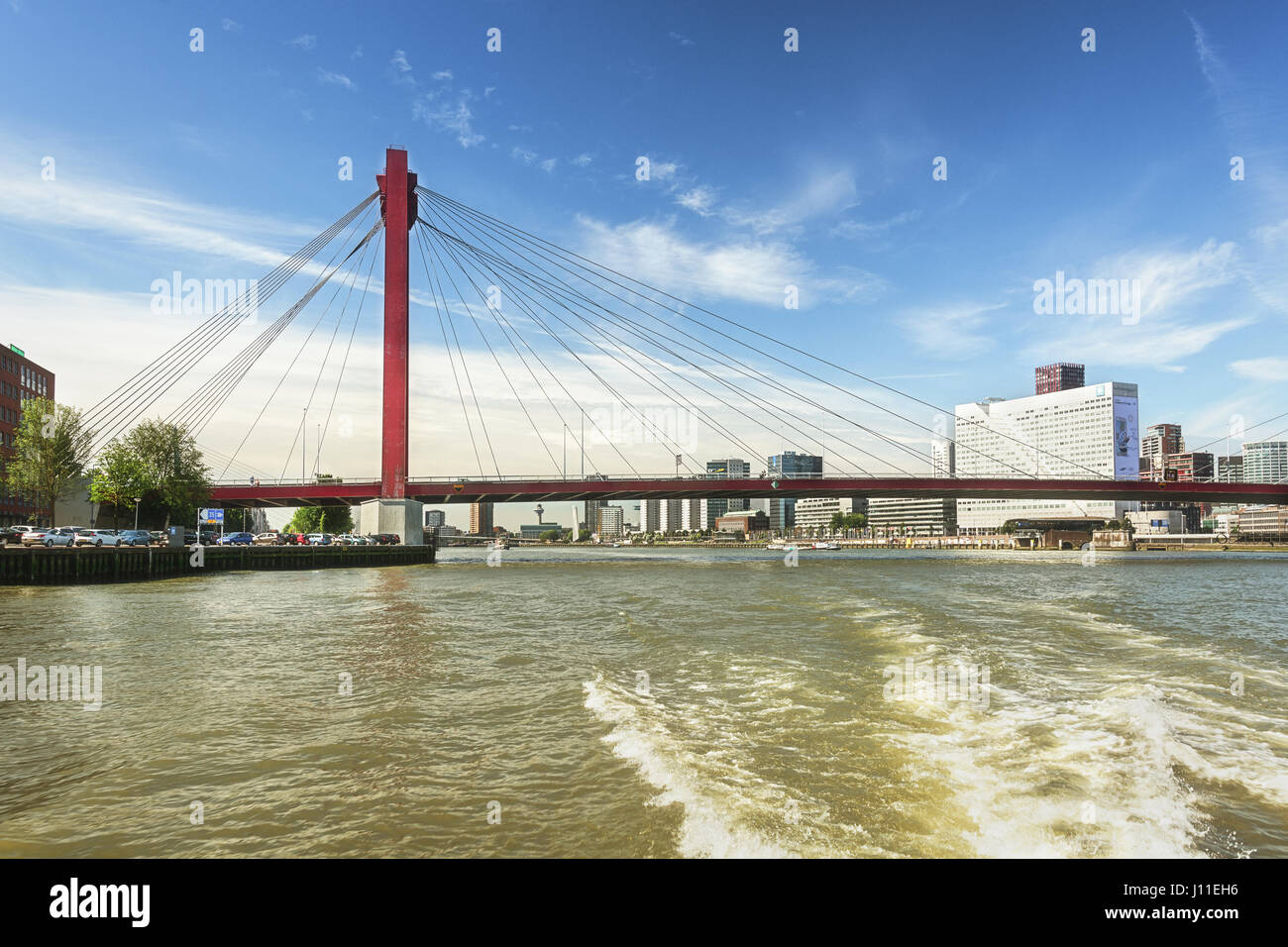 Rotterdam, Netherlands – August 18, 2016: The bridge Willemsbrug spans ...