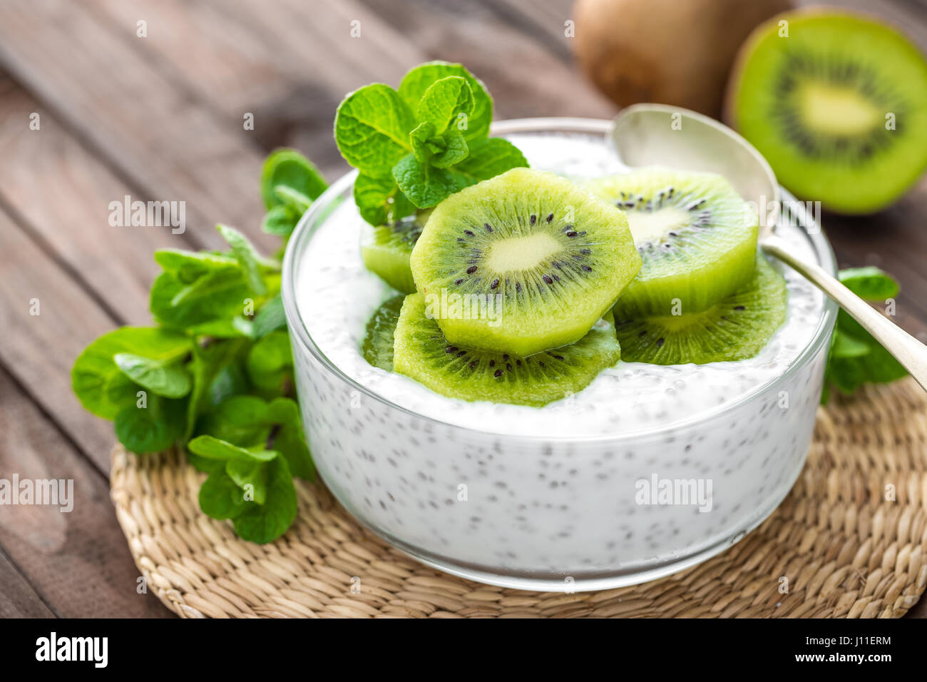 Fresh kiwi yogurt with fruits and chia seeds, healthy breakfast Stock ...