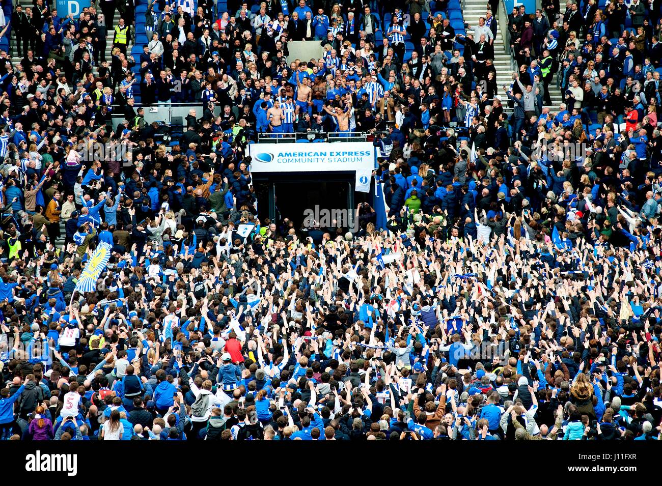 Fans and players of the Brighton and Hove Albion football club ...