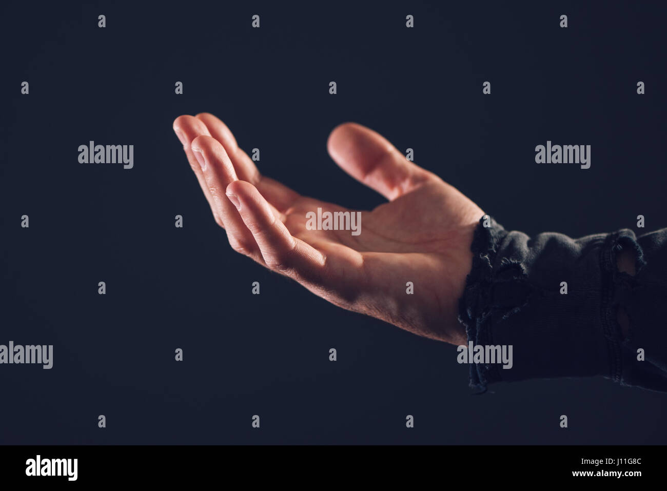 Beggar hand hi-res stock photography and images - Alamy