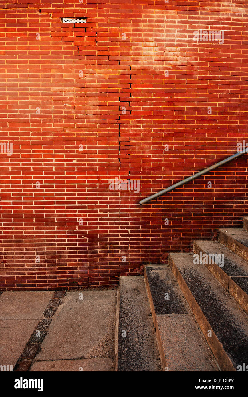 Old weathered staircase and brick wall, backstreet urban detail Stock ...