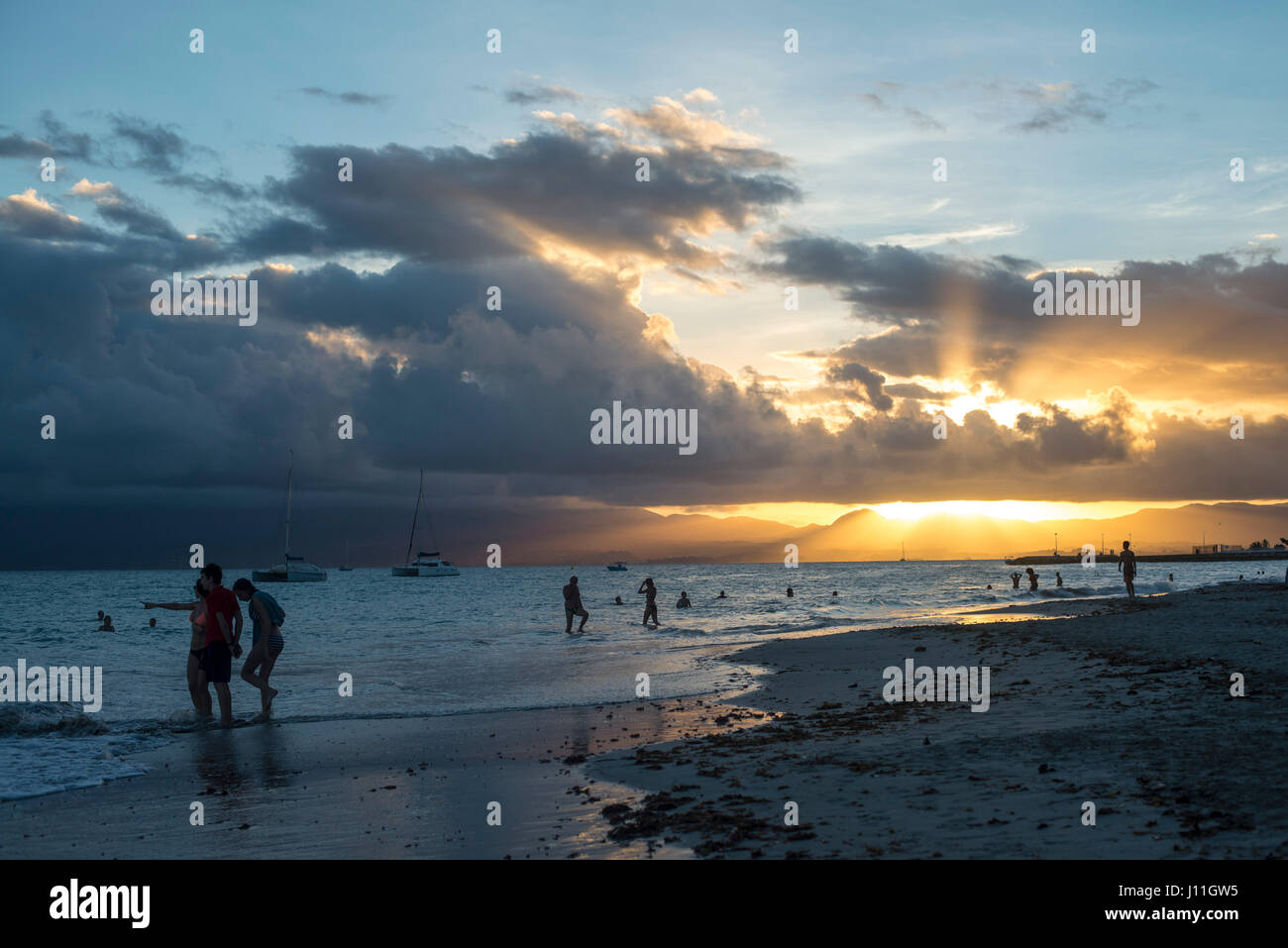 sunset on the beach Stock Photo - Alamy
