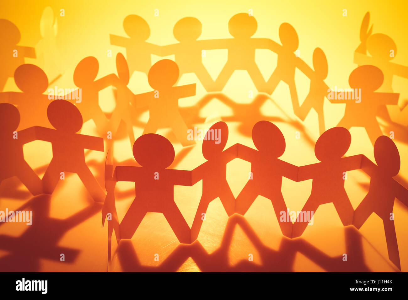 Team of paper doll people Stock Photo - Alamy