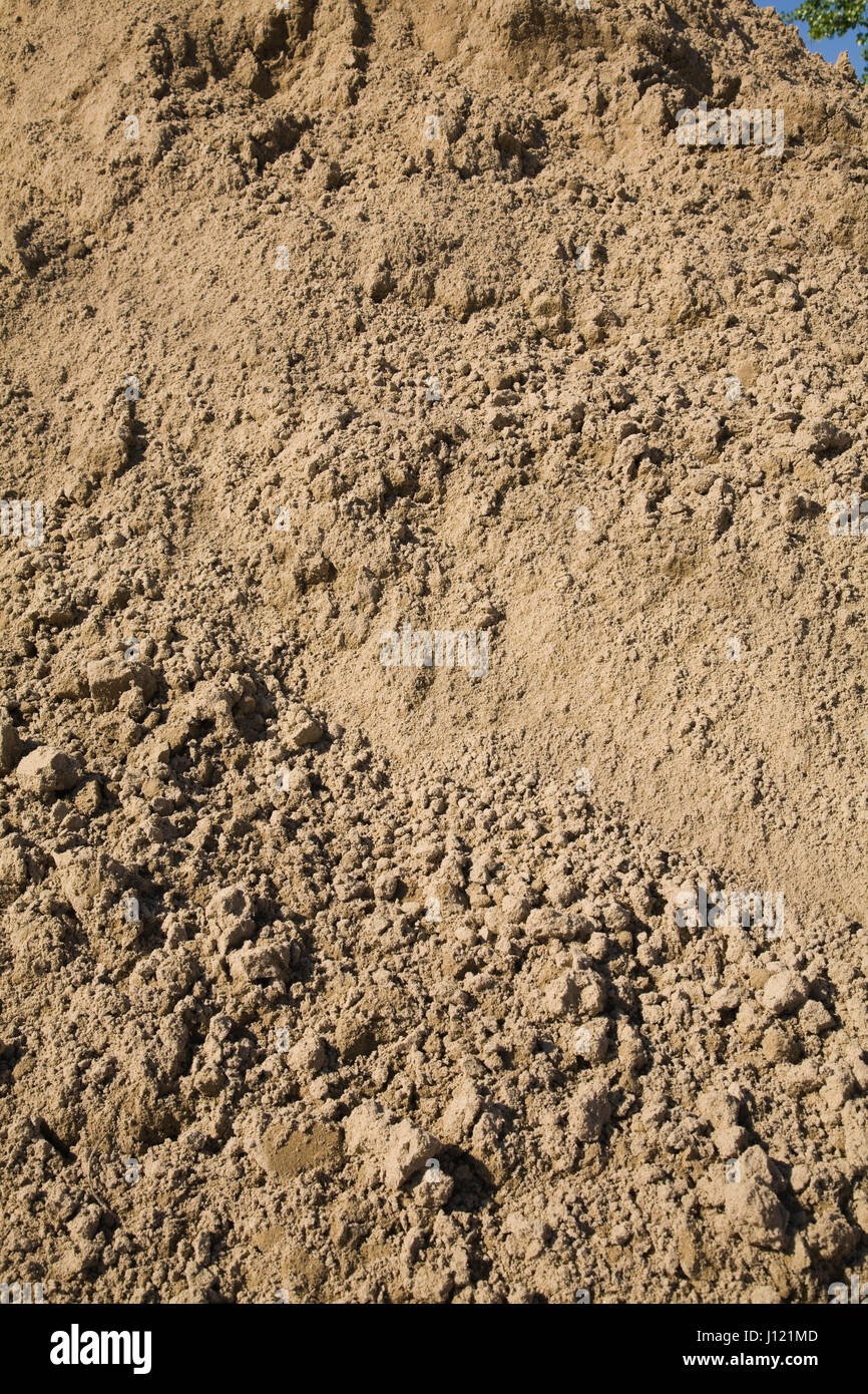 Close-up of a mound of construction sand Stock Photo - Alamy
