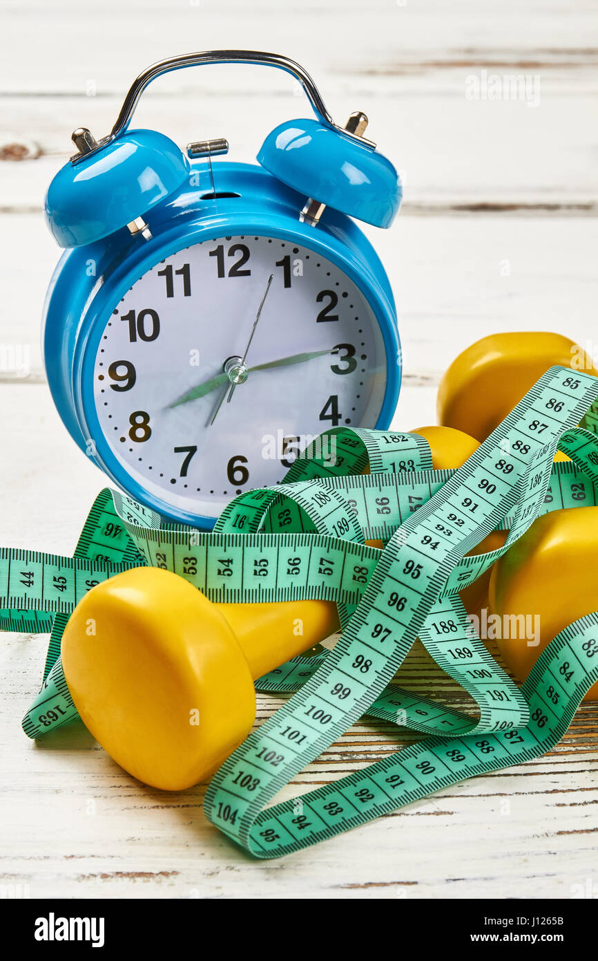Clock with measuring tape and waist hi-res stock photography and images ...