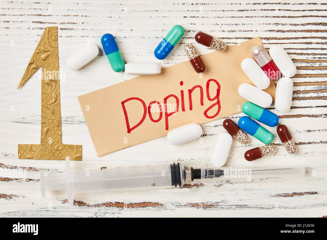 Syringe, pills and card Stock Photo - Alamy