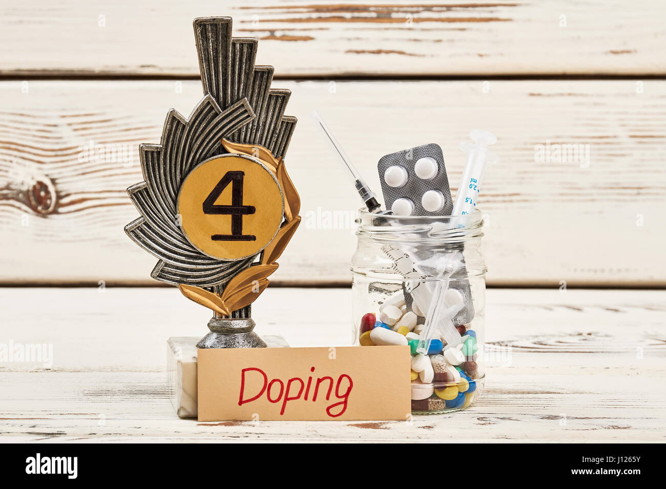 Drugs, award and syringe Stock Photo - Alamy