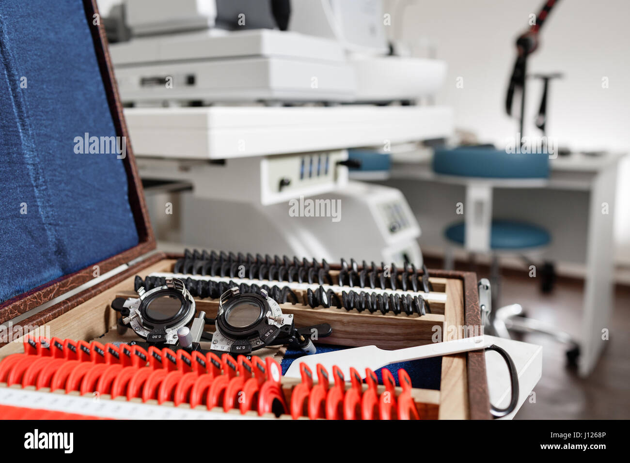 closeup of ophthalmic glasses for vision testing and set of lenses ...