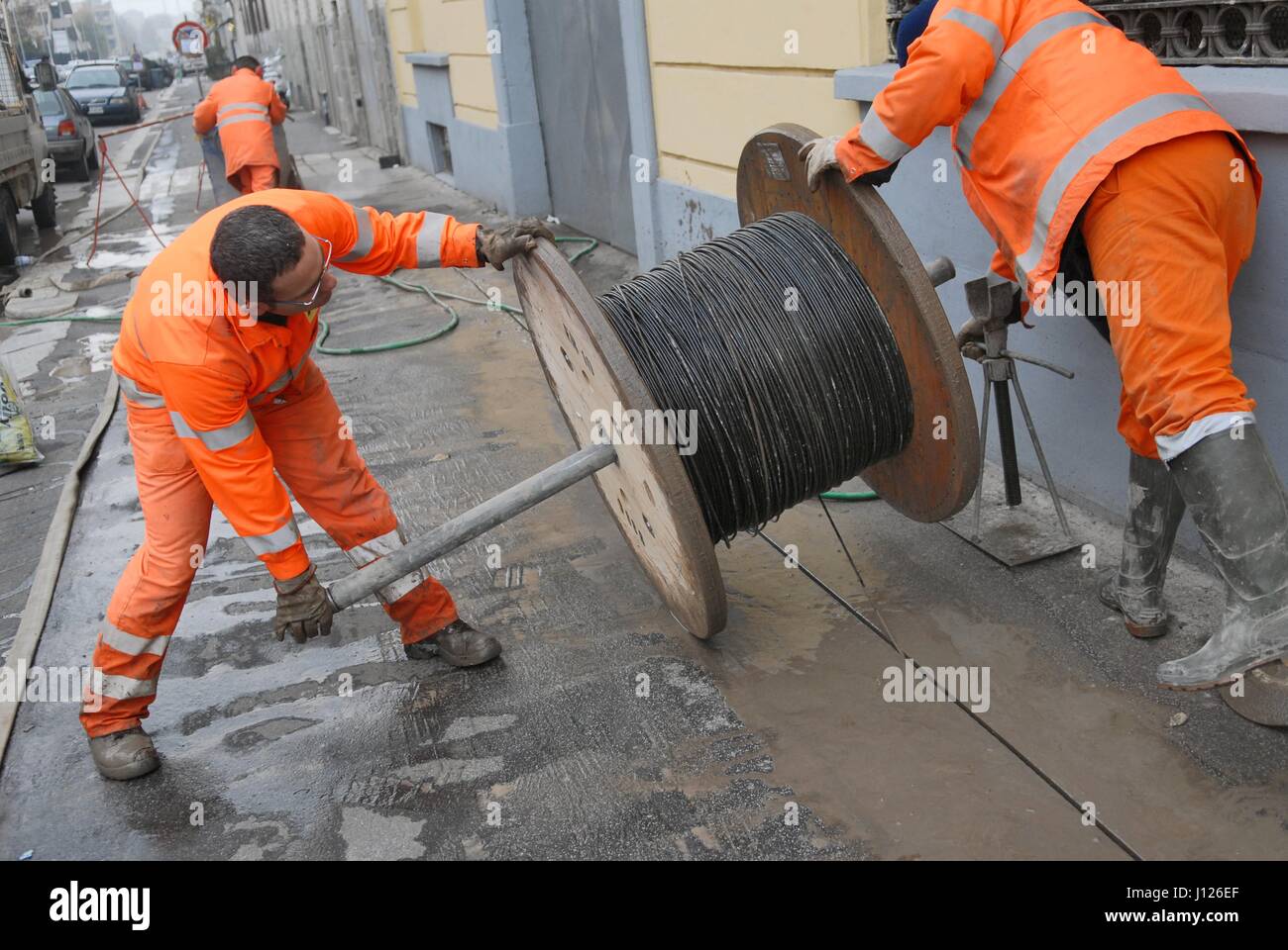 Milan (Italy), street yard for optical fiber wiring Stock Photo - Alamy