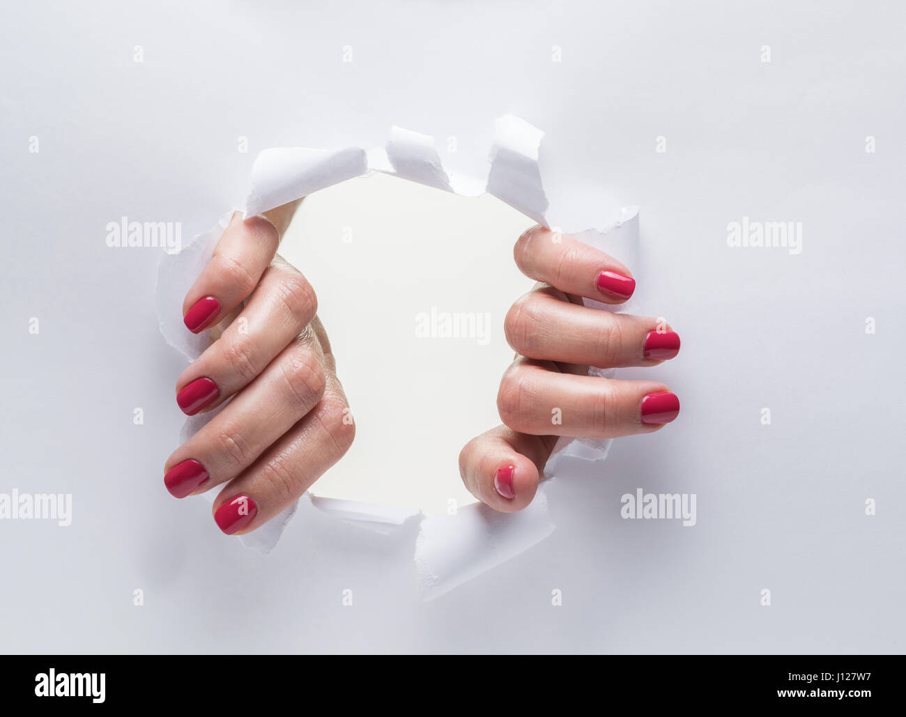 Tearing paper hi-res stock photography and images - Alamy