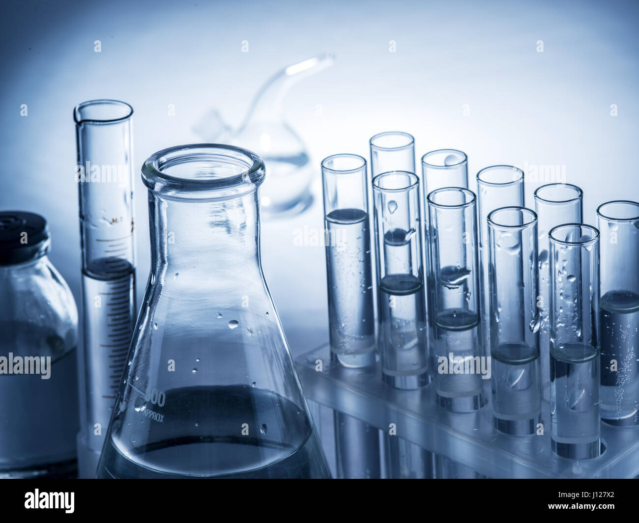 Different laboratory beakers and glassware. Monochrome Stock Photo - Alamy