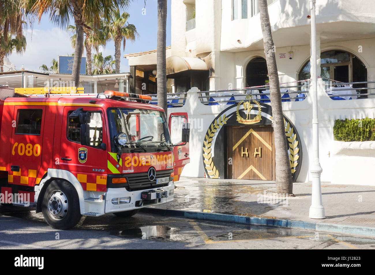 Fire truck, fire engine, in front of Bar restaurant. extinguishing a ...