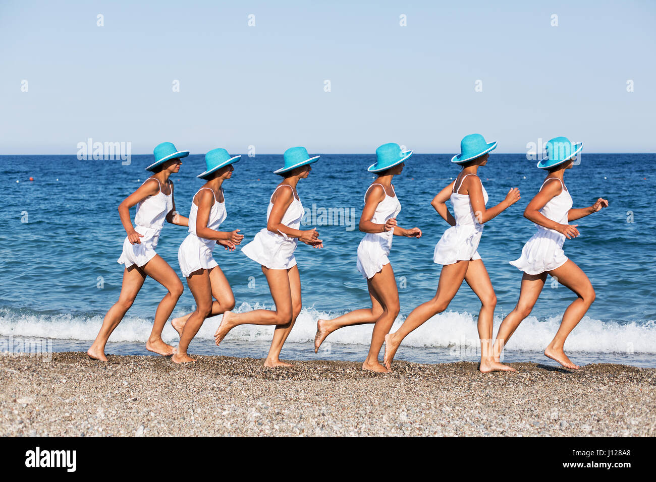 Woman running on the beach. Multiple exposure shot Stock Photo - Alamy