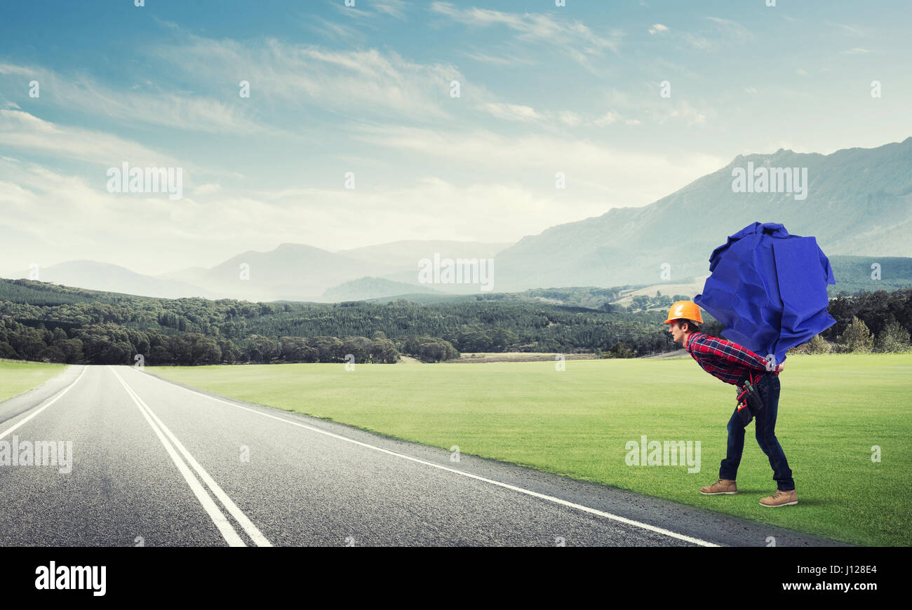 Engineer man carry load Stock Photo - Alamy