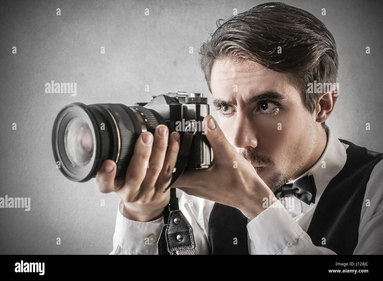 Profile young man camera hi-res stock photography and images - Alamy
