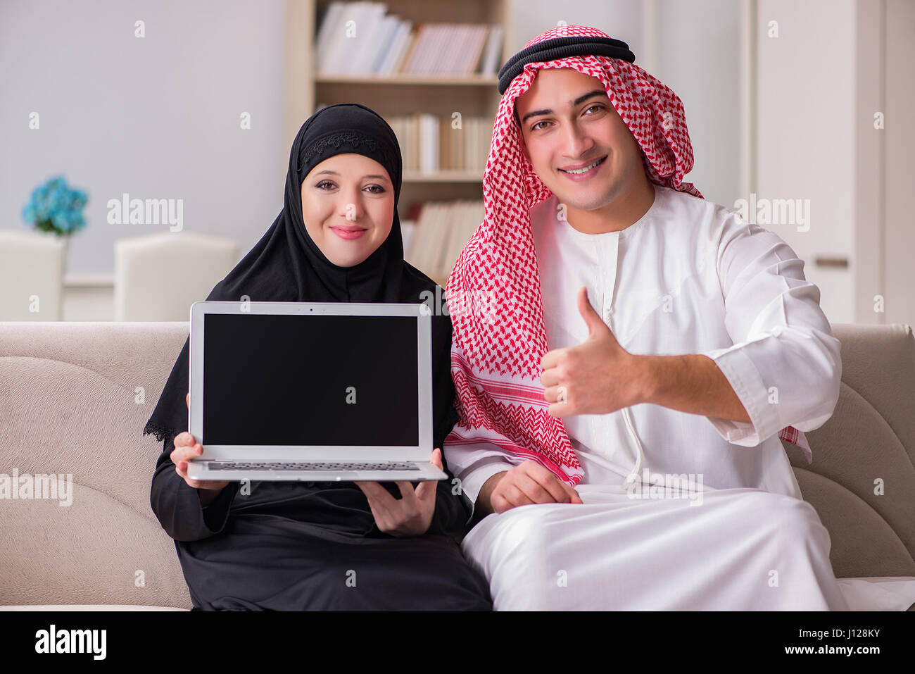 Pair of arab man and woman Stock Photo - Alamy