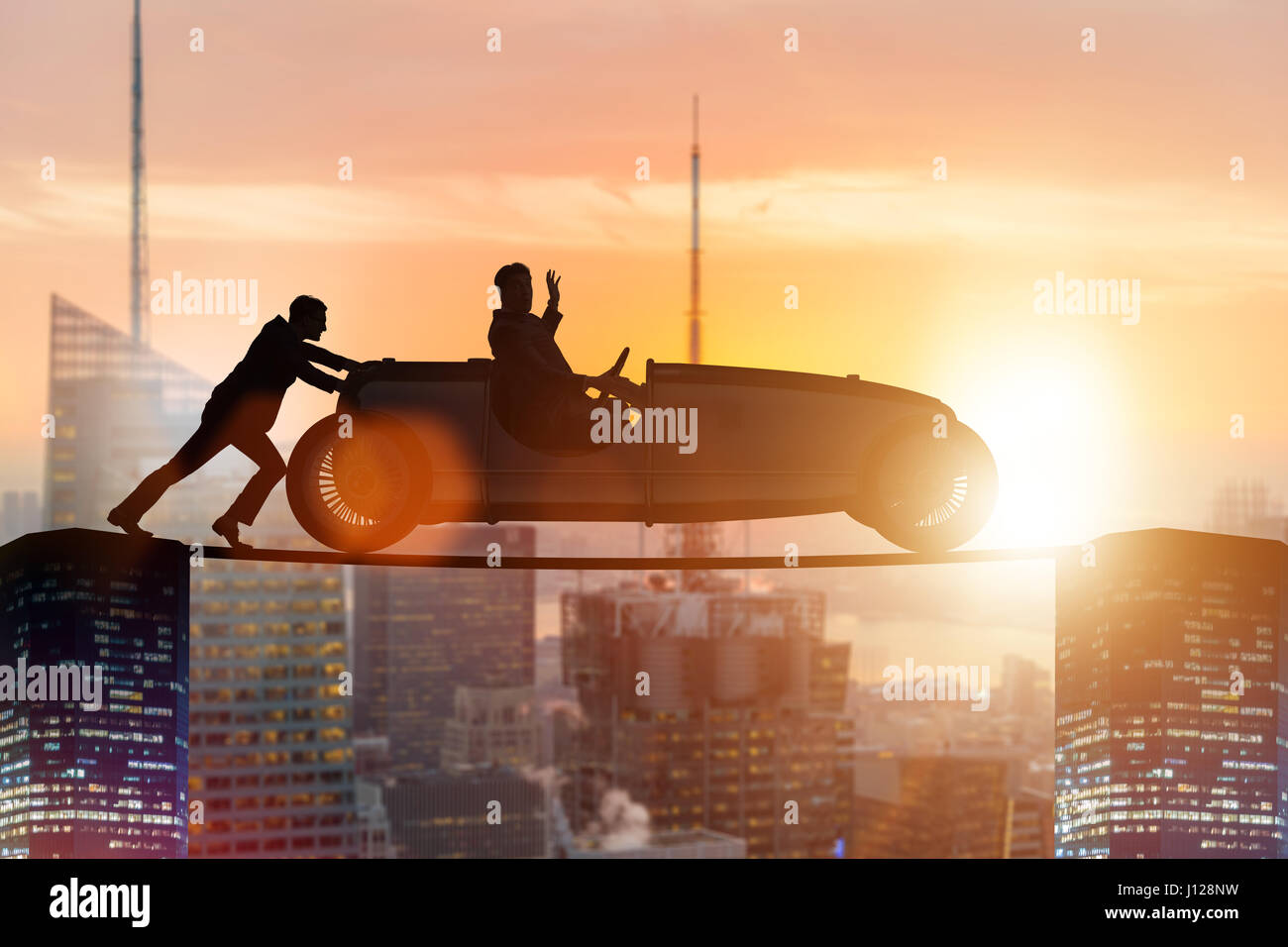 Teamwork concept with businessman pushing car Stock Photo - Alamy