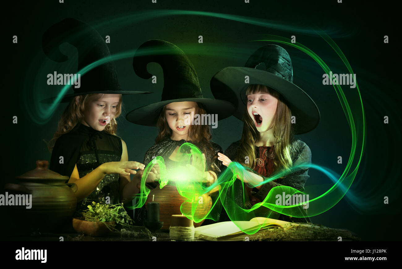 Three little witches Stock Photo - Alamy