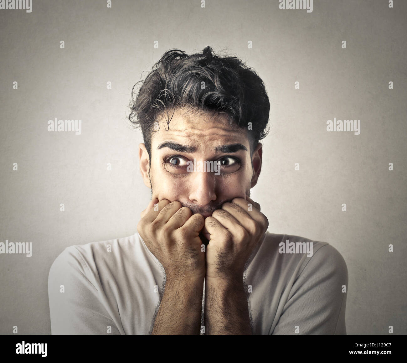 Man being scared inside Stock Photo - Alamy