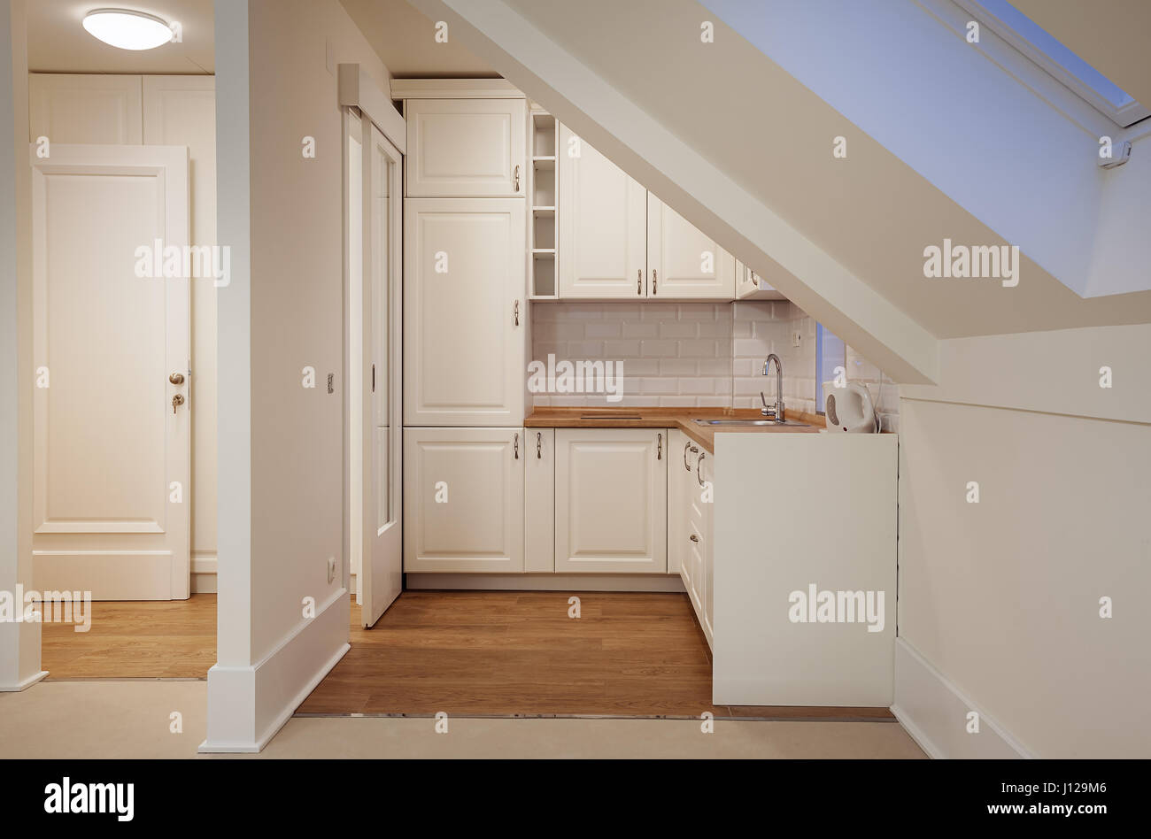 Structure of a modern small kitchen, hotel room interior Stock Photo ...