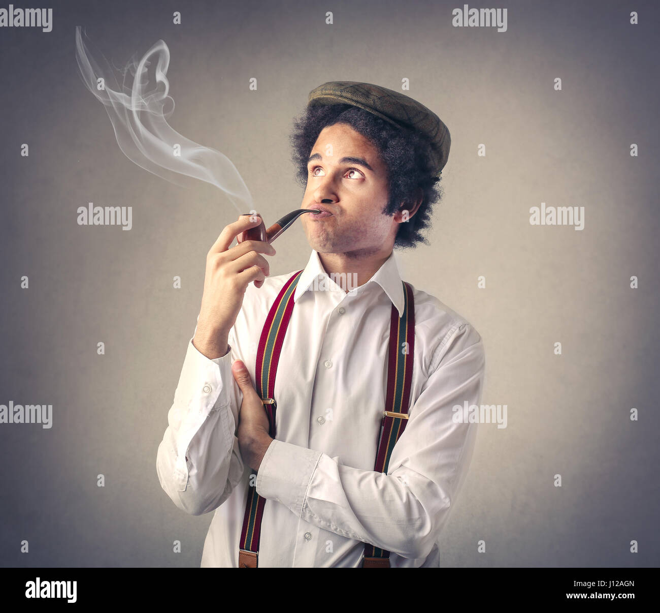 Man smoking with pipe Stock Photo - Alamy
