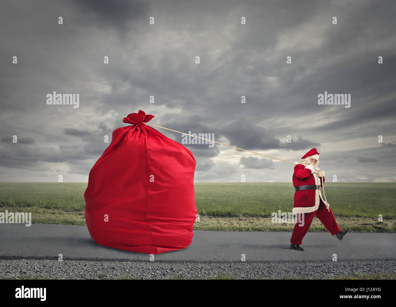 Santa with huge bag Stock Photo - Alamy