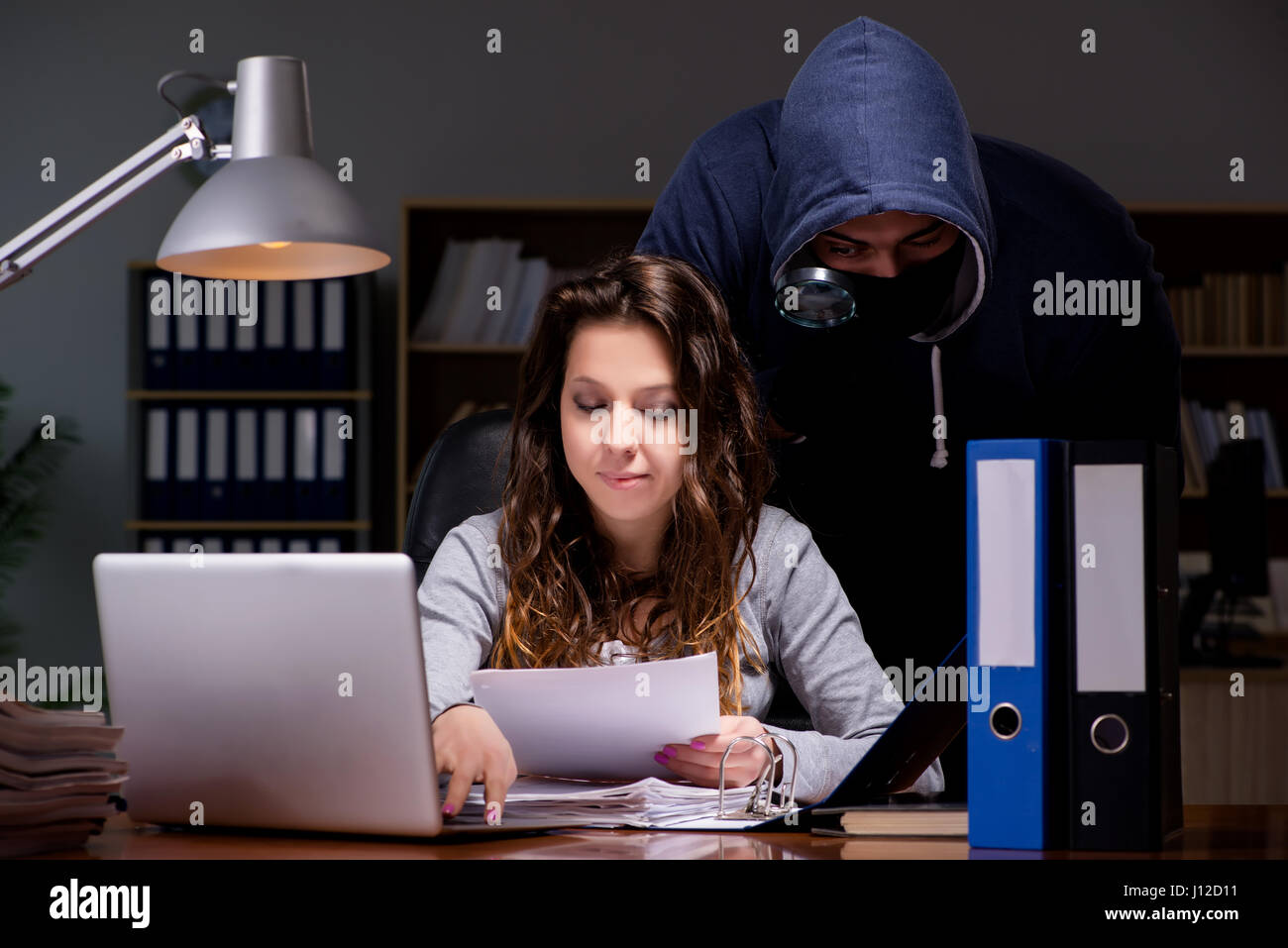 Hacker stealing personal data from home computer Stock Photo - Alamy