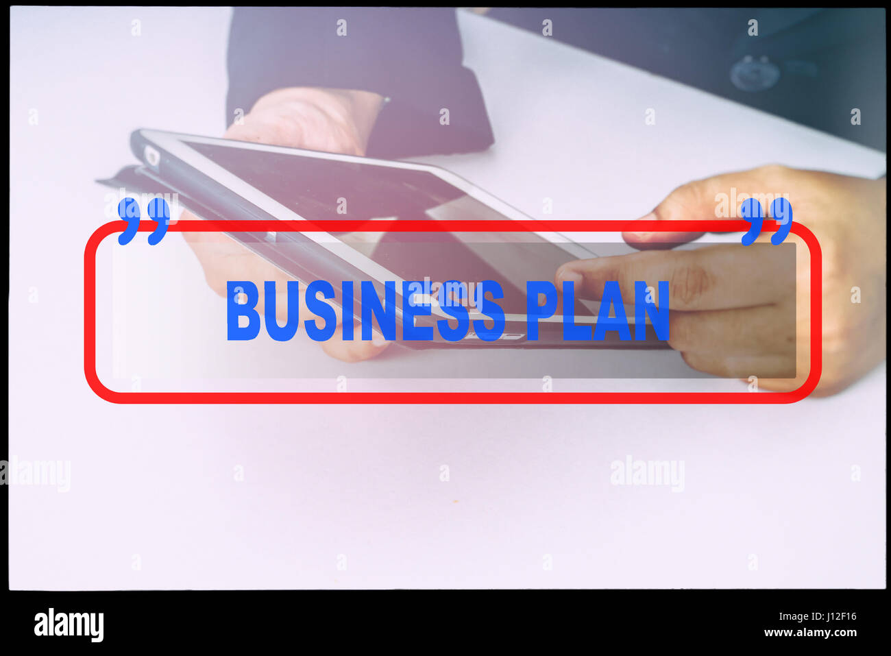 Hand and text "BUSINESS PLAN" with vintage background. Technology ...