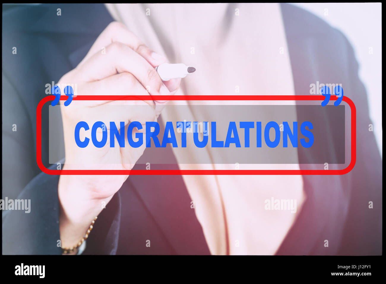 Hand and text "CONGRATULATIONS" with vintage background. Technology ...