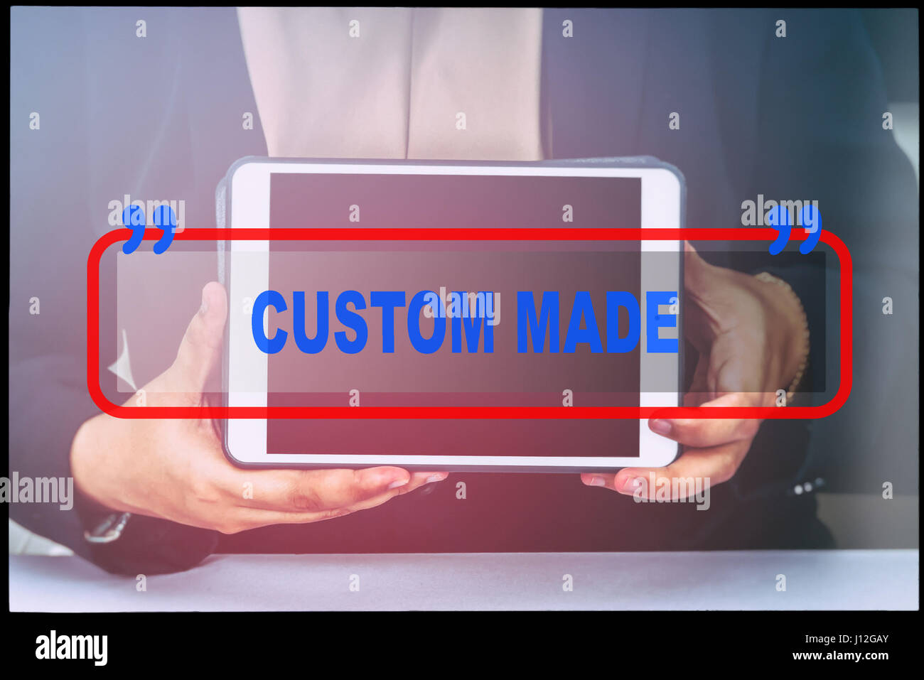 Hand and text "CUSTOM MADE" with vintage background. Technology concept ...