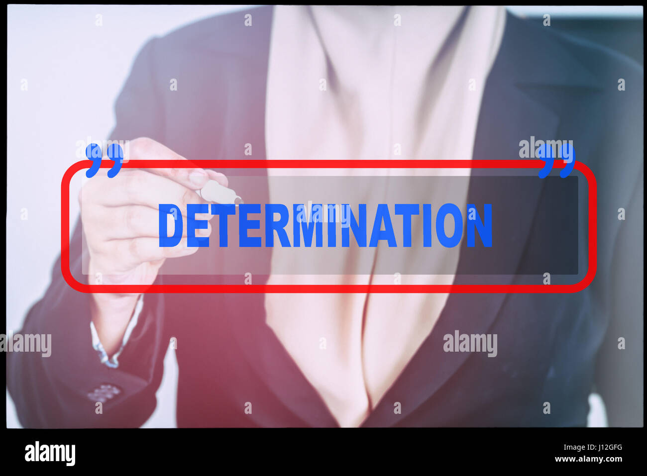 Hand and text "DETERMINATION" with vintage background. Technology ...