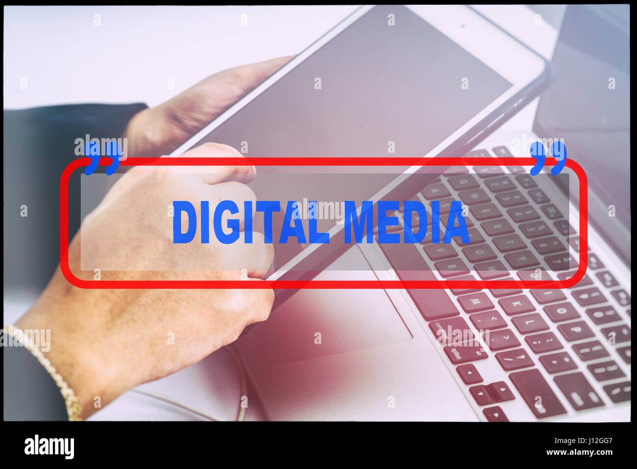 Hand and text "DIGITAL MEDIA" with vintage background. Technology ...