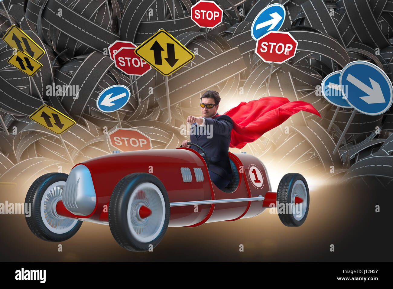 Superhero businessman driving vintage roadster Stock Photo - Alamy