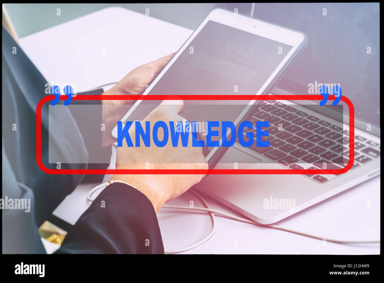 Hand and text "KNOWLEDGE" with vintage background. Technology concept ...