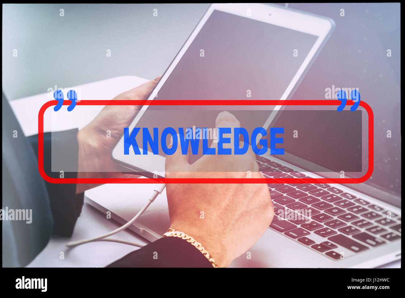 Hand and text "KNOWLEDGE" with vintage background. Technology concept ...