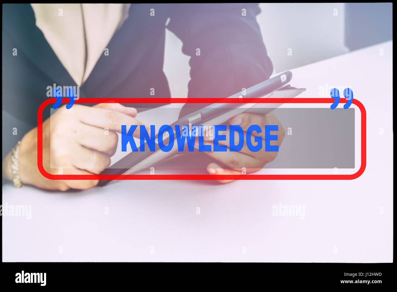Hand and text "KNOWLEDGE" with vintage background. Technology concept ...