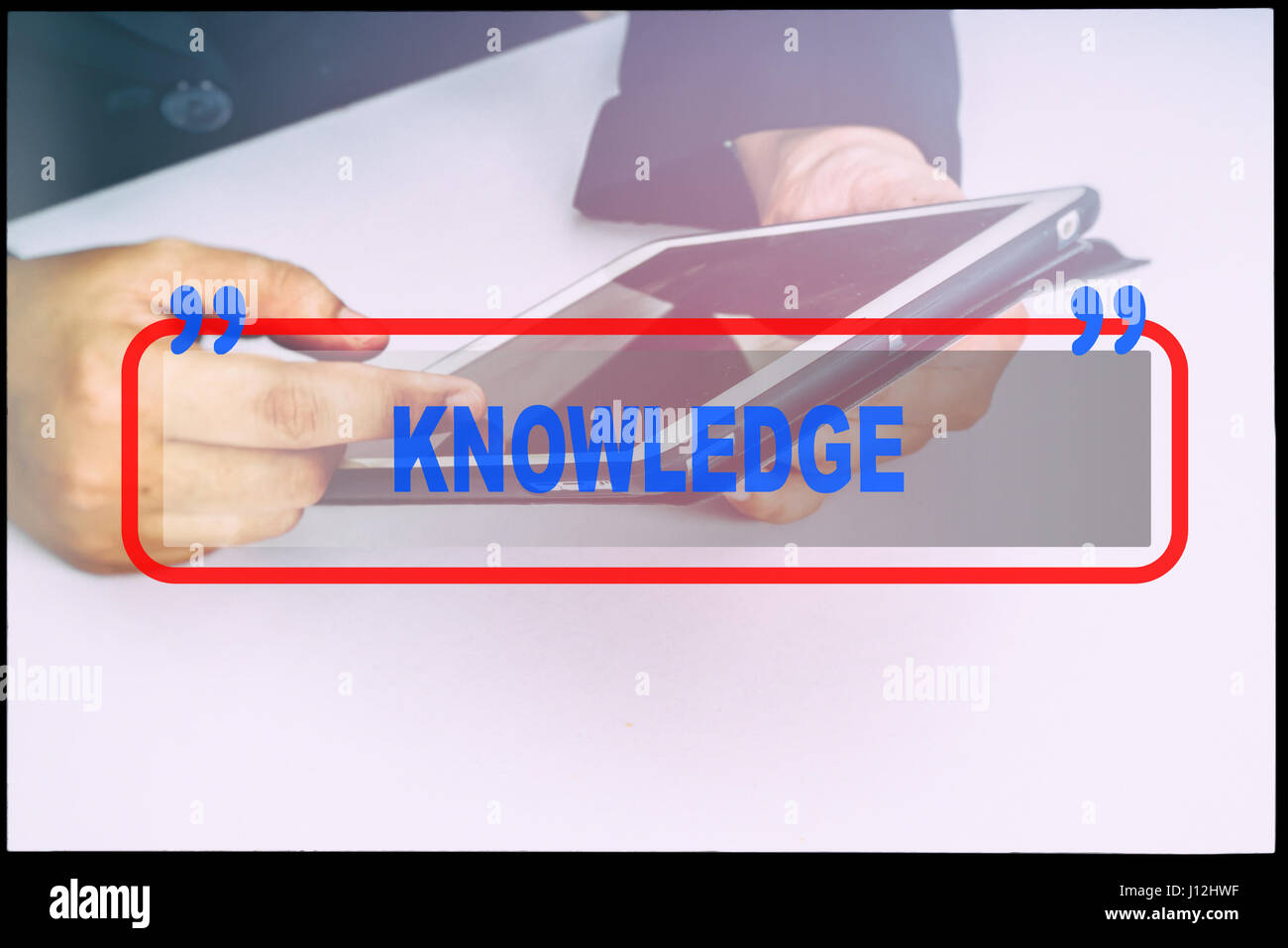 Hand and text "KNOWLEDGE" with vintage background. Technology concept ...