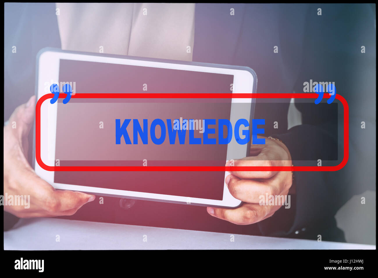 Hand and text "KNOWLEDGE" with vintage background. Technology concept ...
