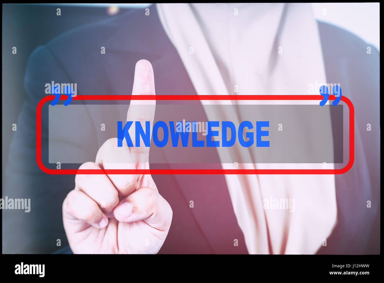 Hand and text "KNOWLEDGE" with vintage background. Technology concept ...