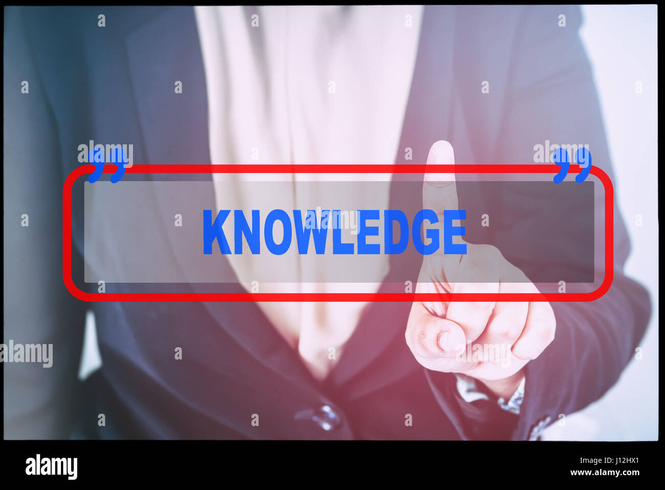 Hand and text "KNOWLEDGE" with vintage background. Technology concept ...