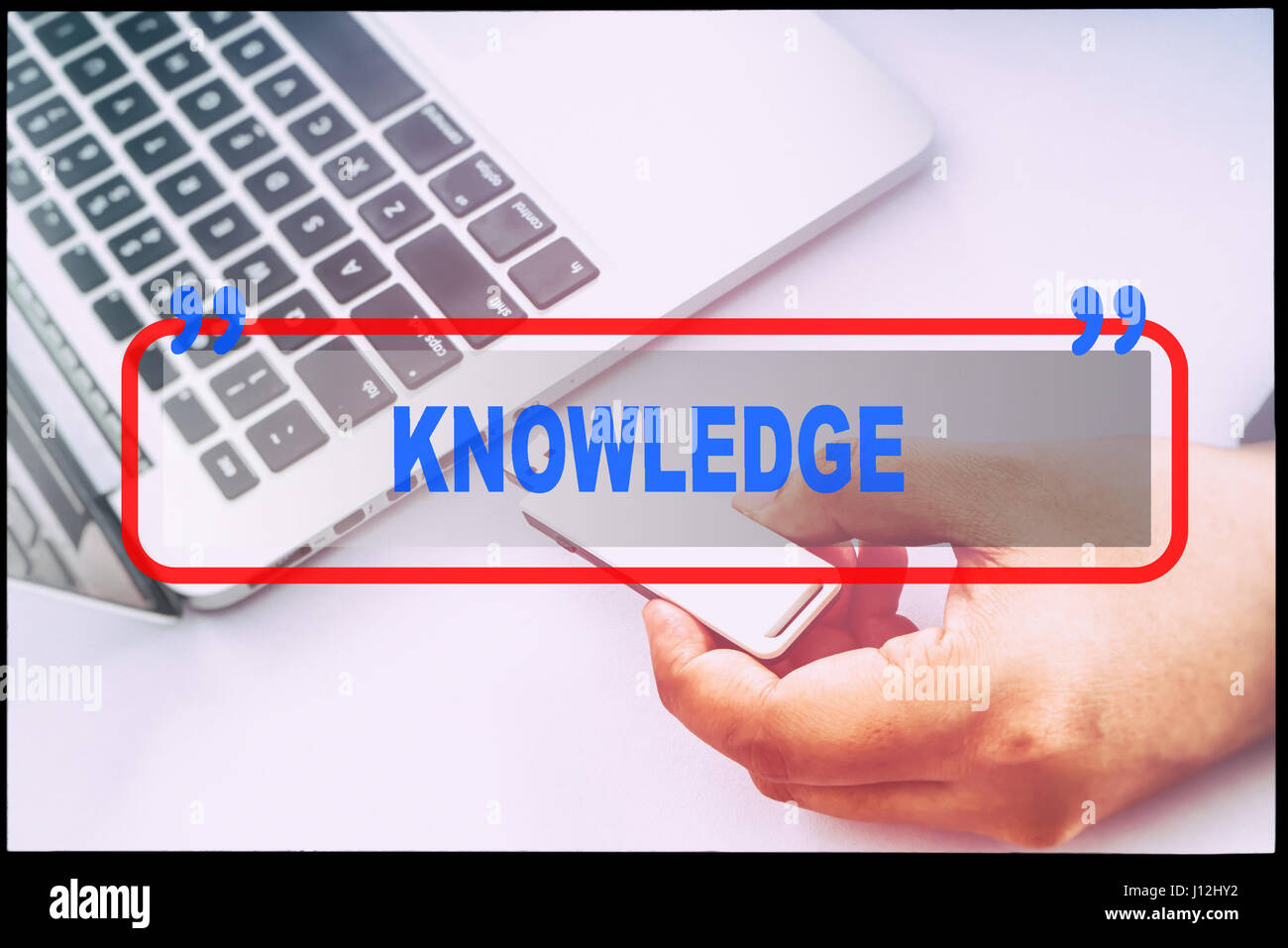 Hand and text "KNOWLEDGE" with vintage background. Technology concept ...