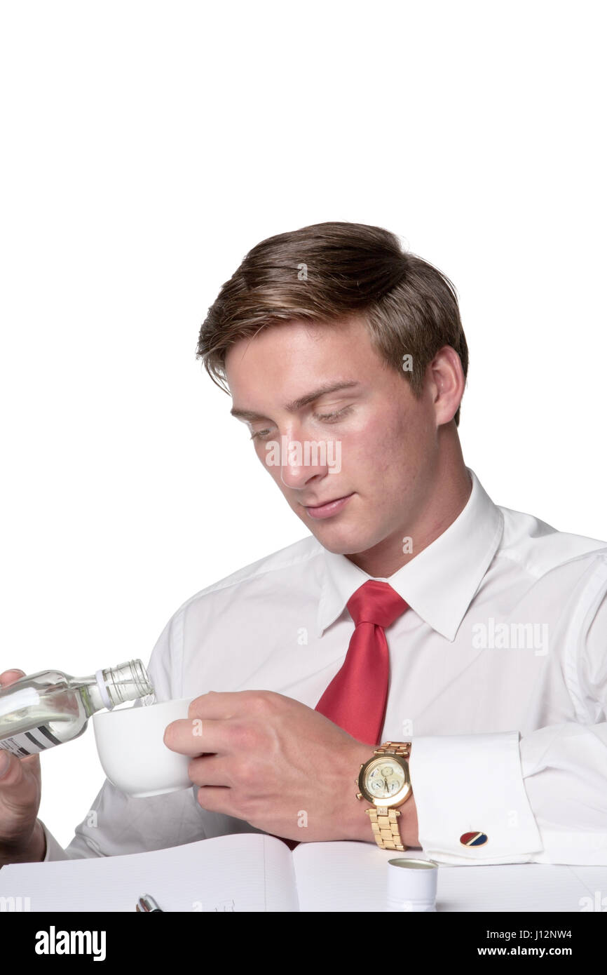 business man drinking alcohol at work sneakily Stock Photo - Alamy
