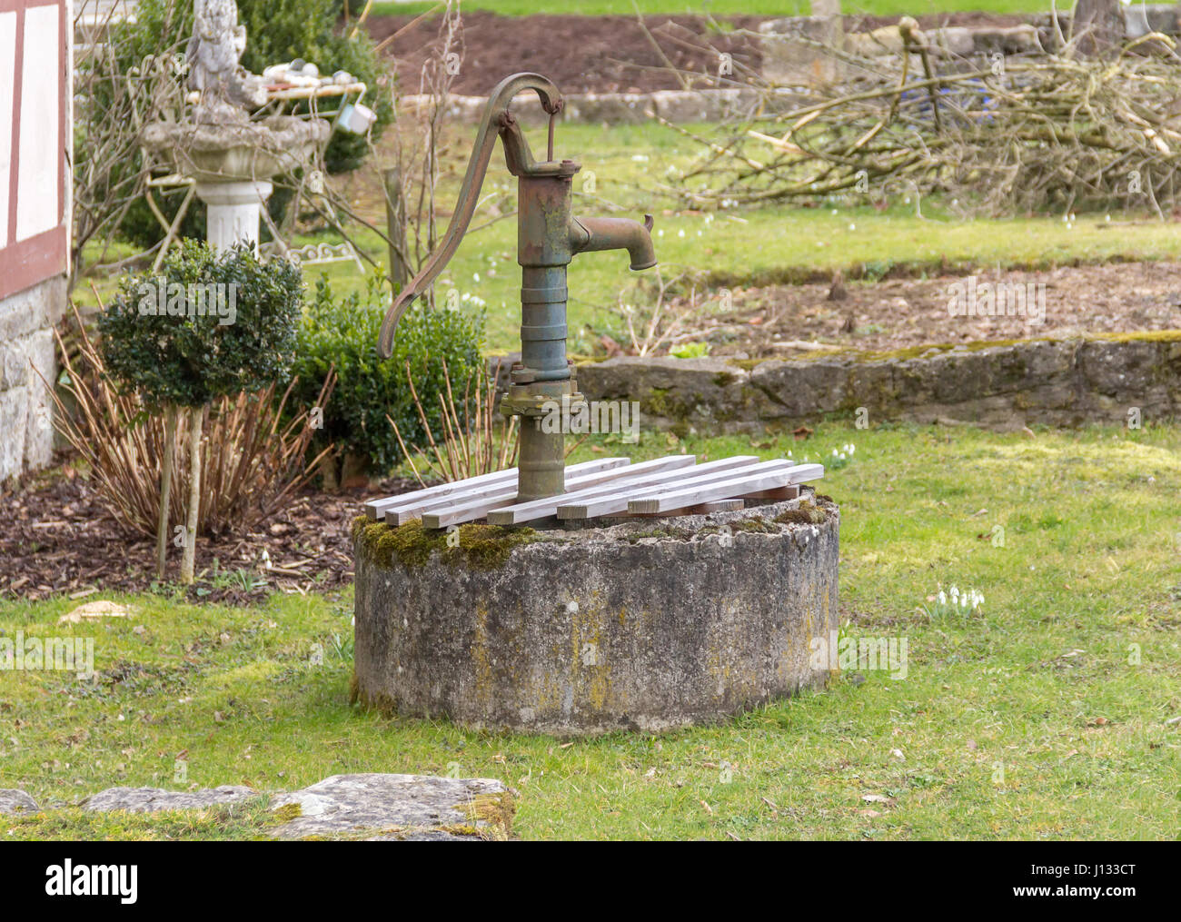 rural scenery including a nostalgic water pump Stock Photo - Alamy