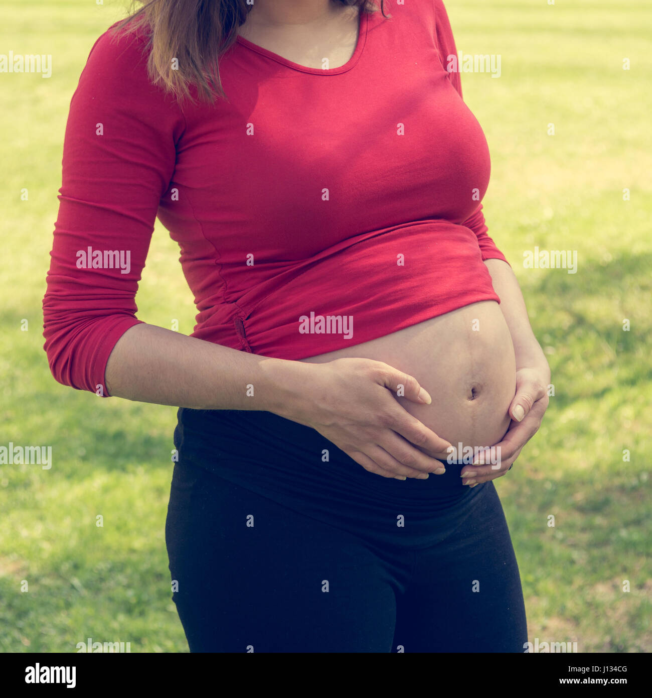 Red belly shirt hi-res stock photography and images - Alamy